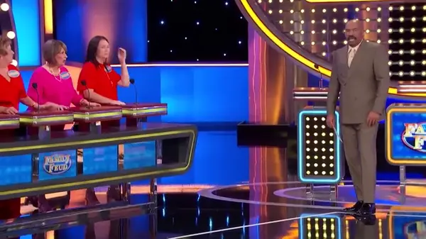 Steve Harvey breaks down in tears at the podium. - Family Feud | Xumo Play